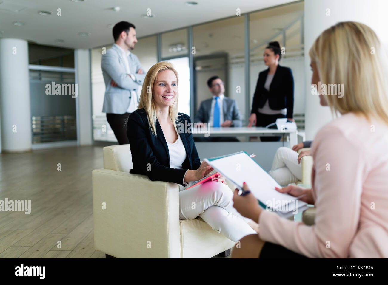 Picture of attractive saleswoman working in office Stock Photo - Alamy