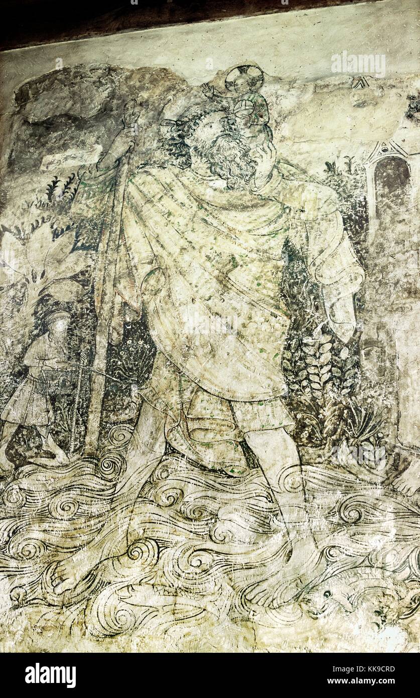 Medieval mural painting showing Saint Christopher carrying Christ in ...