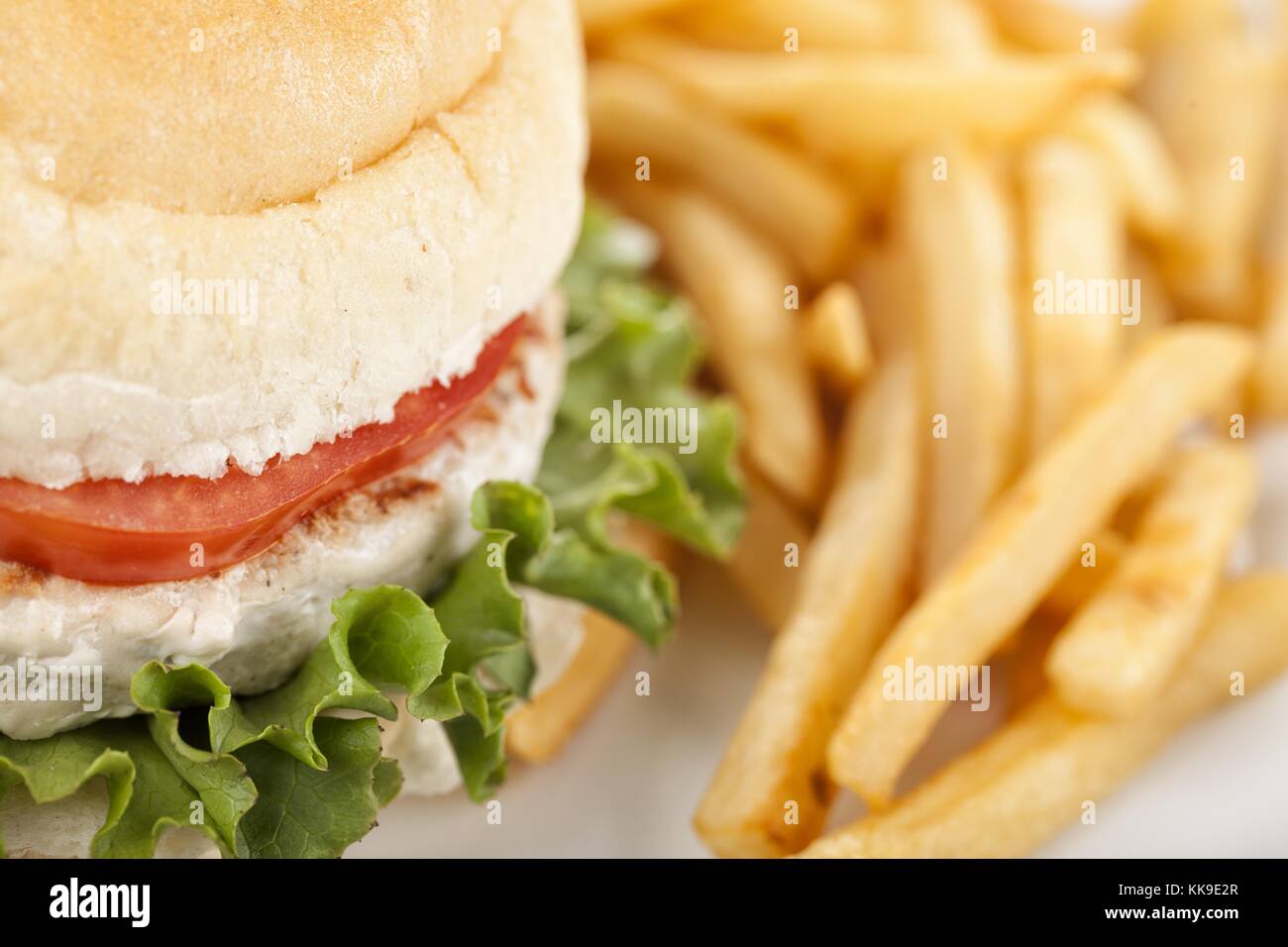 Chicken burger shot in studio Stock Photo - Alamy