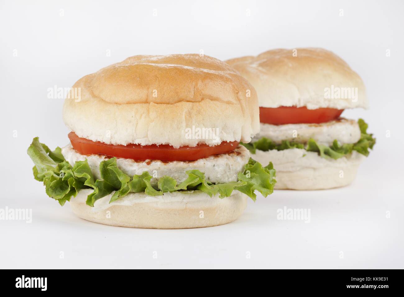 Chicken burger shot in studio Stock Photo - Alamy