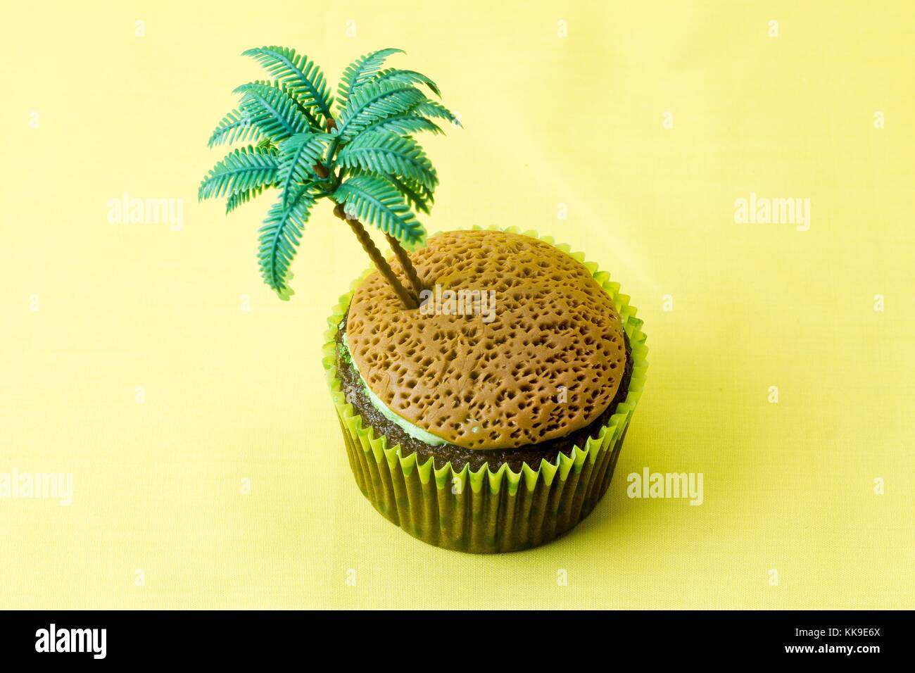 close up image of cupcake with a plastic coconut tree miniature Stock ...