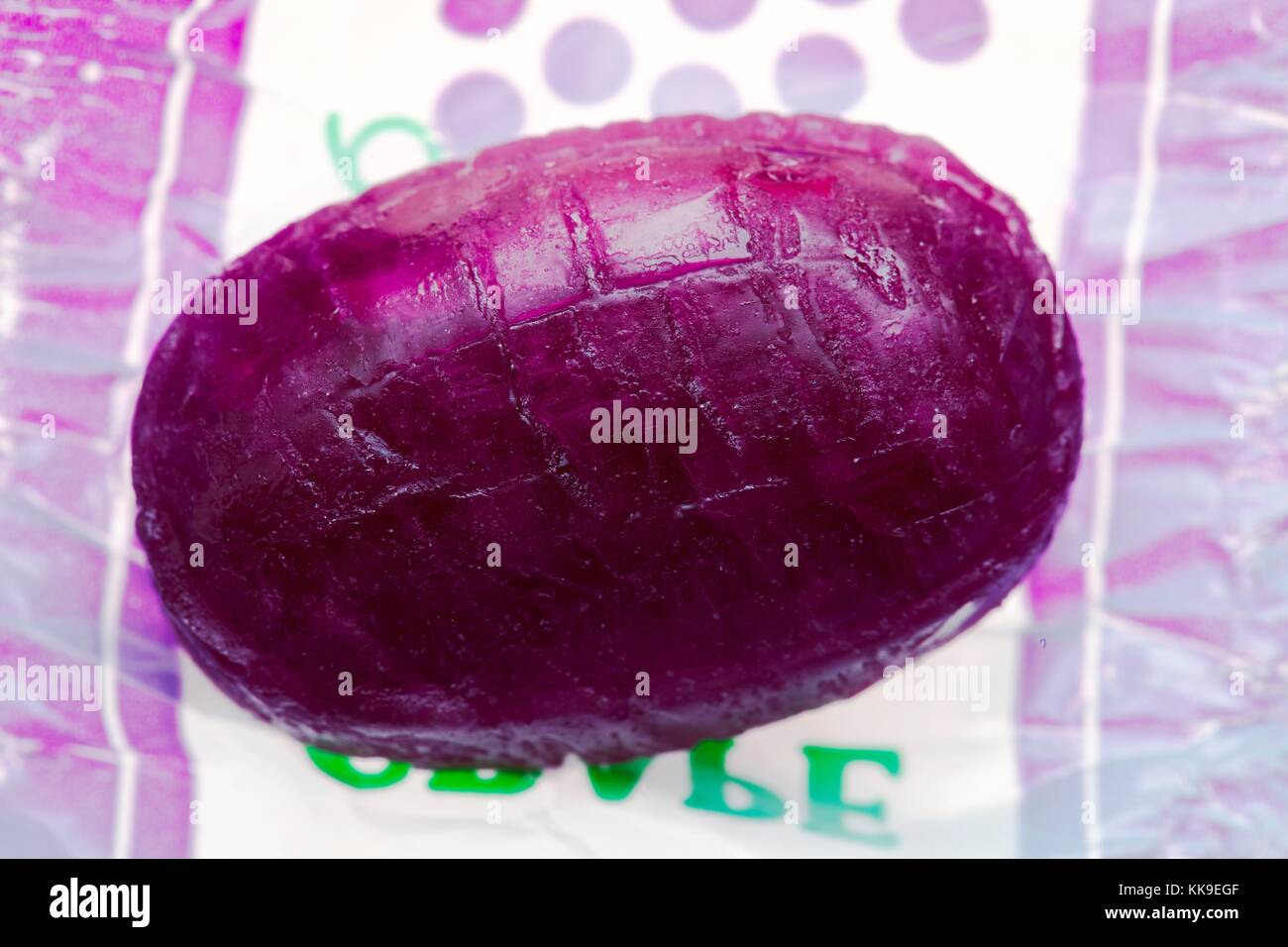 detailed image of a purple candy Stock Photo - Alamy