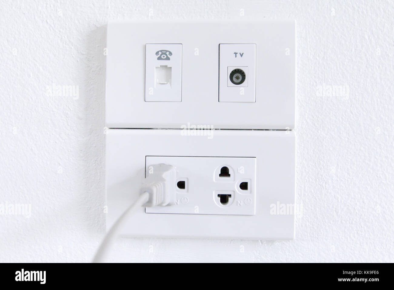 White electric plugs on wall background,White outlet interior, interior ...