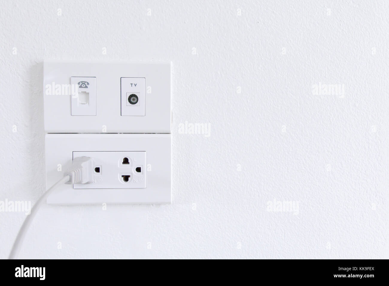White electric plugs on wall background,White outlet interior, interior ...