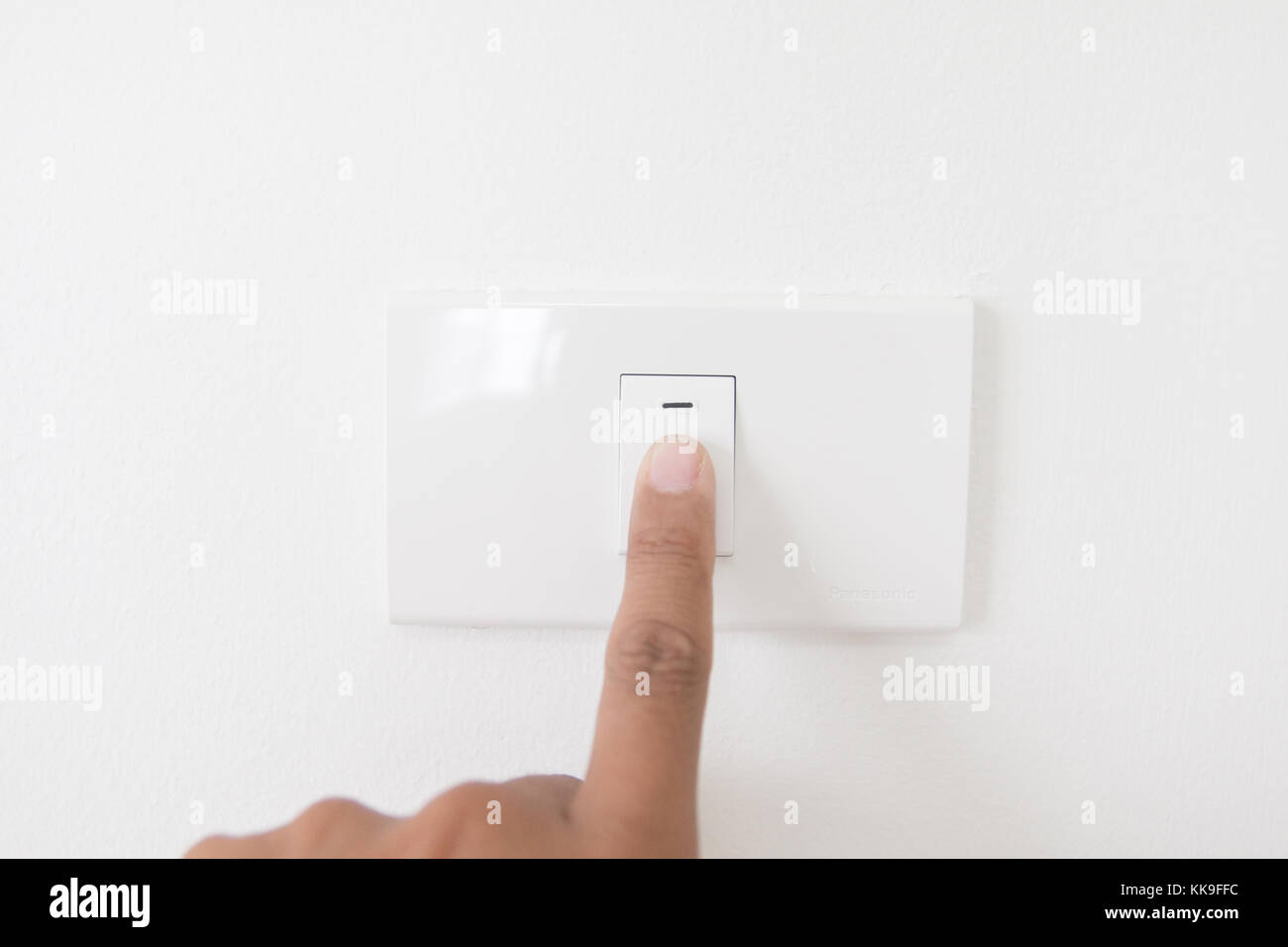 Closeup hand turn off a power button,Finger press light button,Hand ...