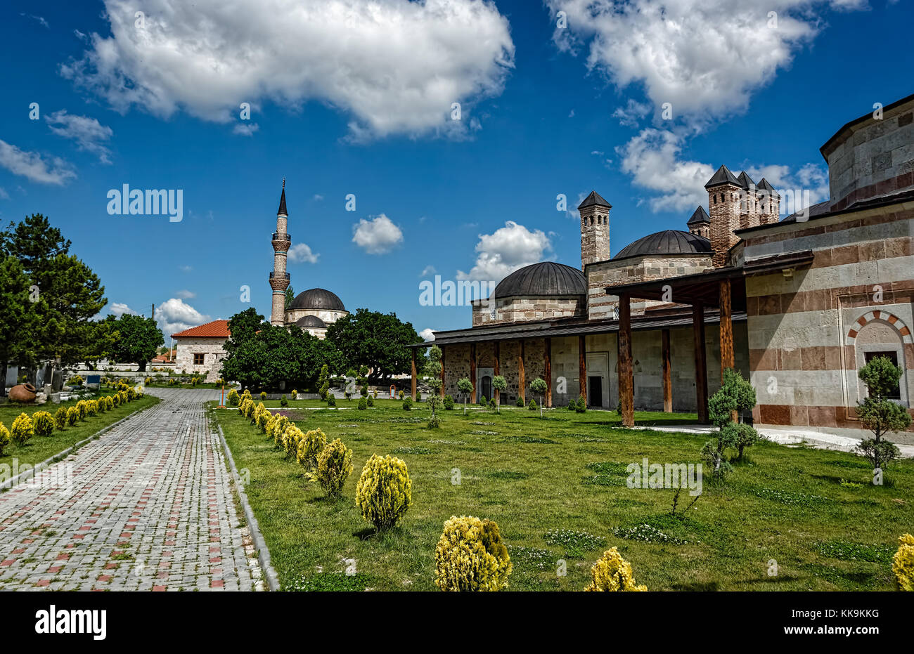 Historical Buildings in a green landscape with blue sky and fluffy ...