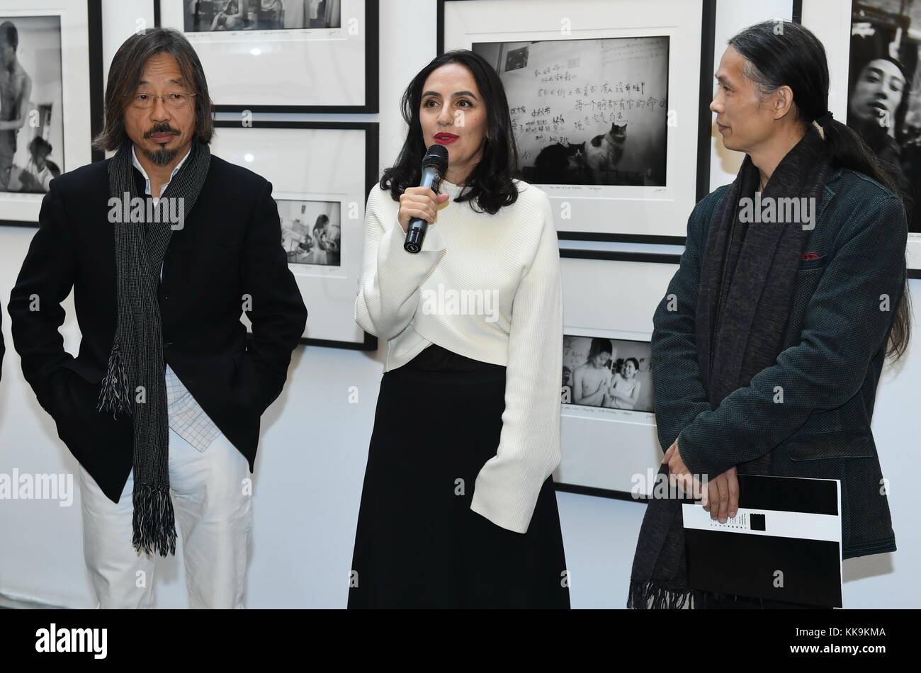 French photographer Anaistamo Martane (centre), the wife of Chinese ...