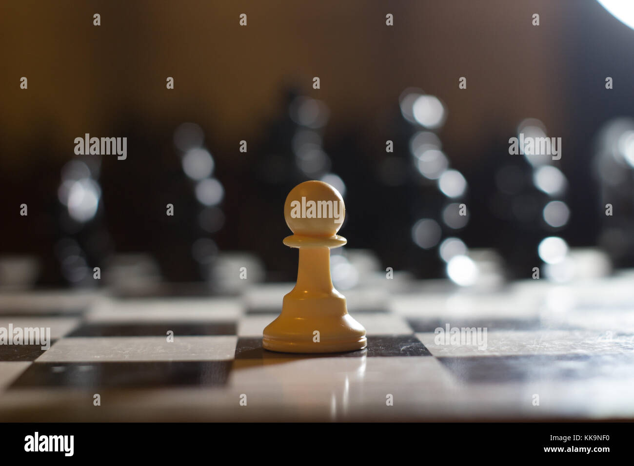 chessbord soldier pawn alone facing many enemies single light Stock ...