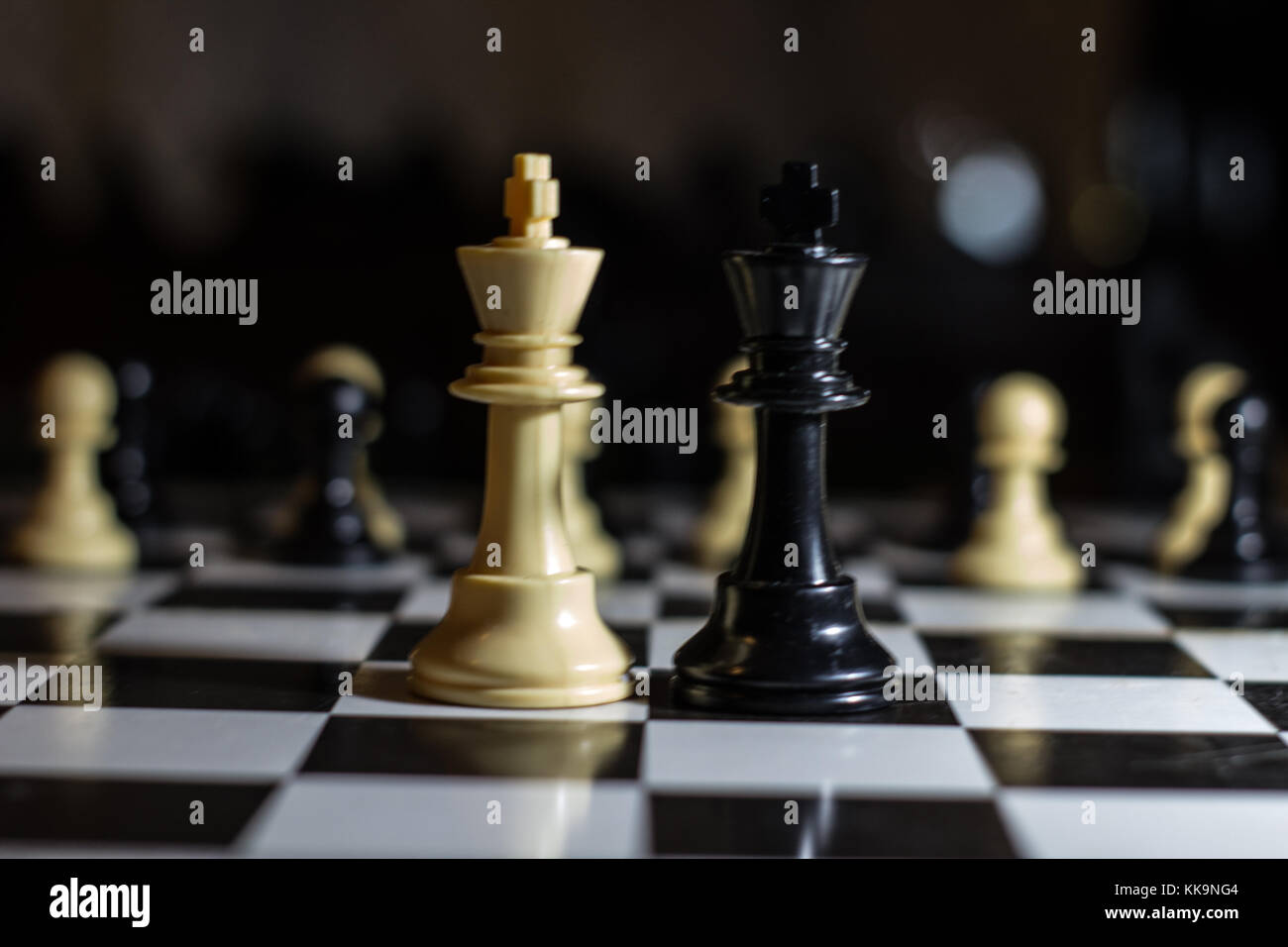two kings chess board facing each other against a revolution from the ...
