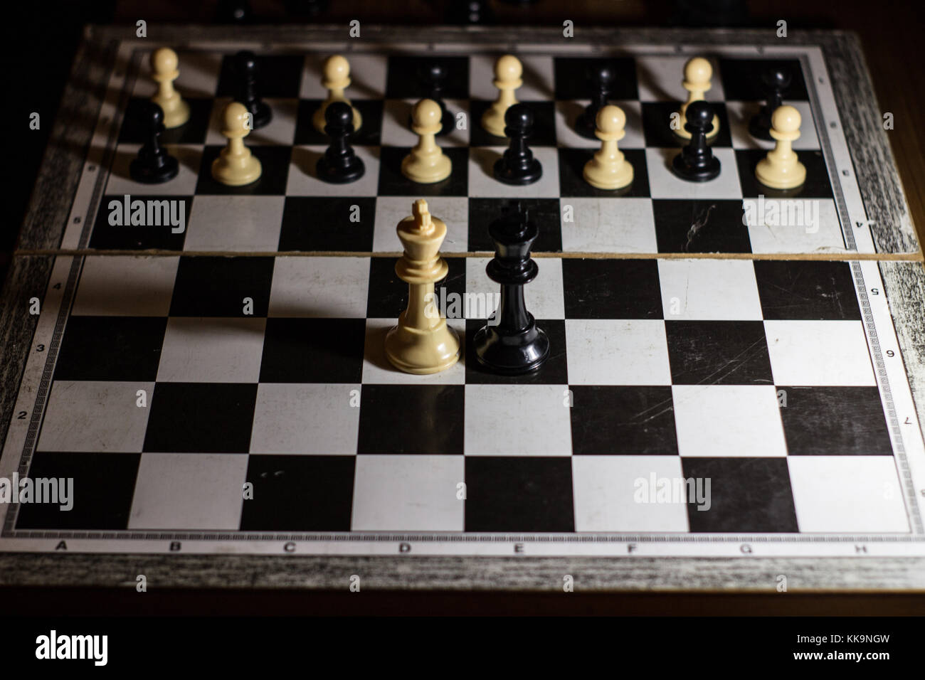 two kings chess board facing each other against a revolution from the ...
