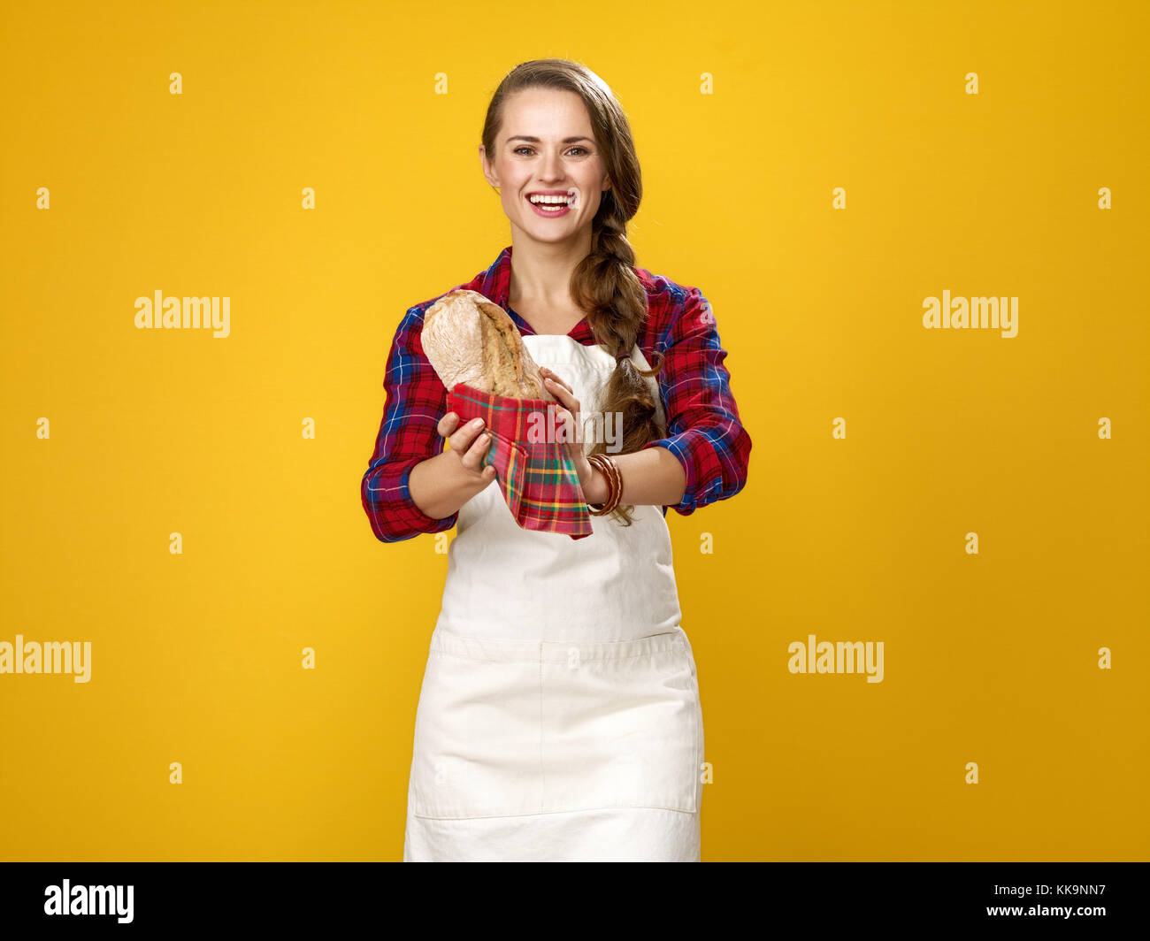 Healthy food to your table. Portrait of smiling young woman cook ...