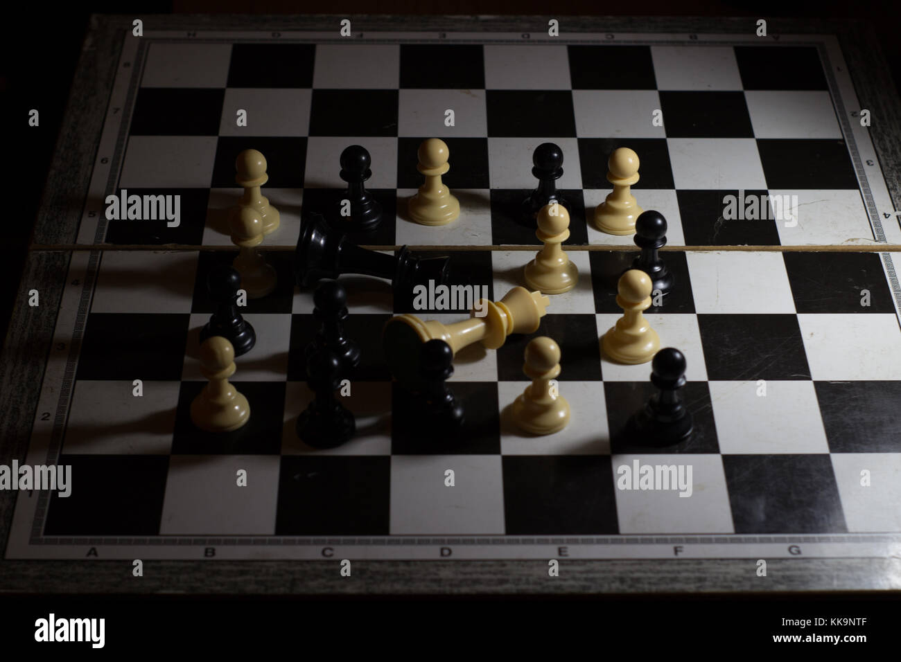 chess board from the side with multiple moves made game Stock Photo - Alamy