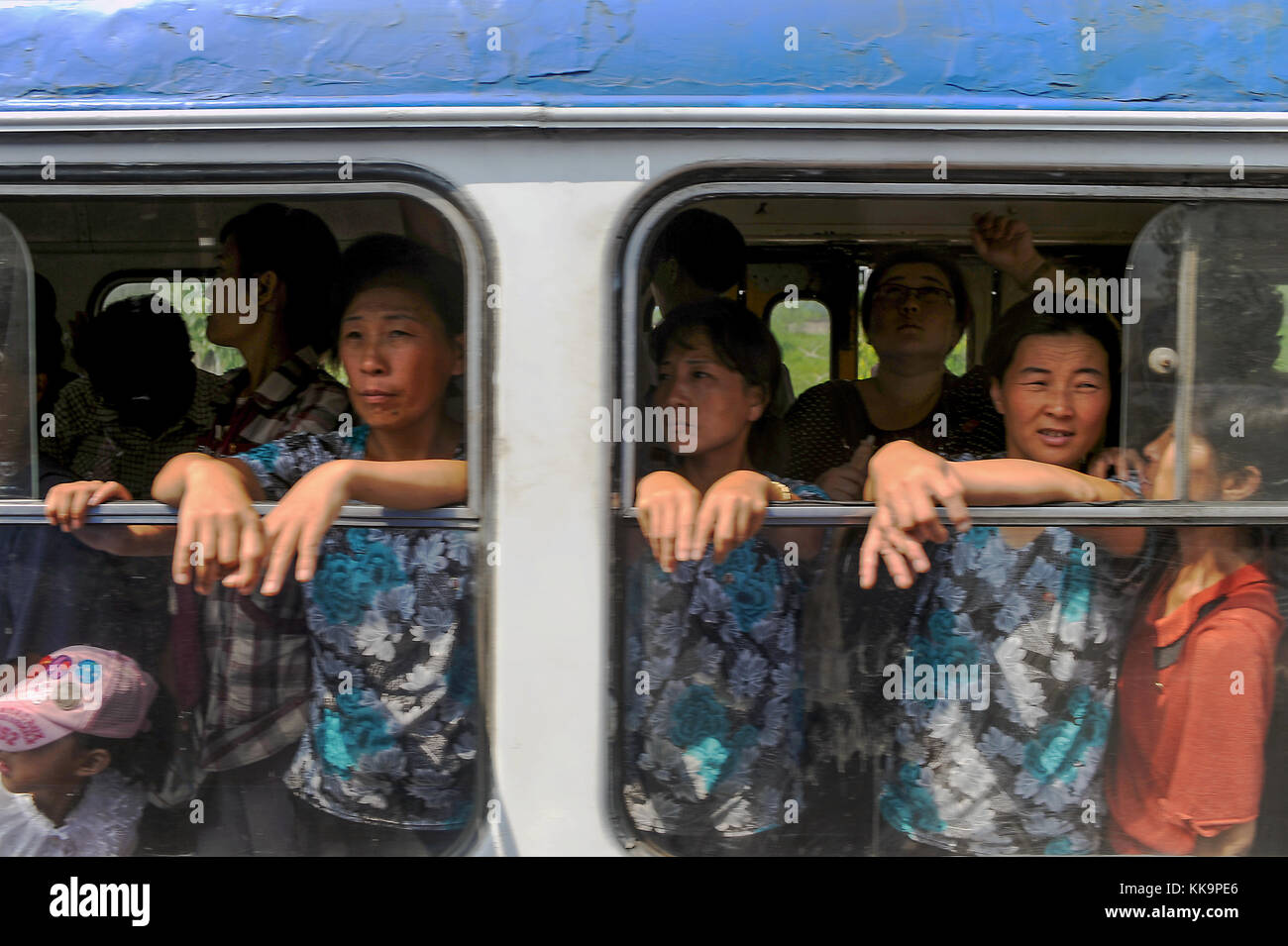 Pjoengjang, North Korea, people in a crowded tram Stock Photo - Alamy