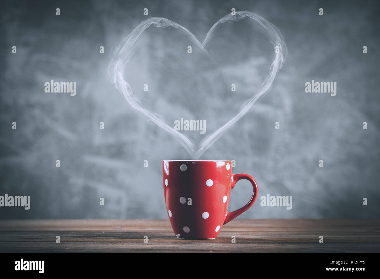 Cup of coffee with heart shaped steam Stock Photo - Alamy