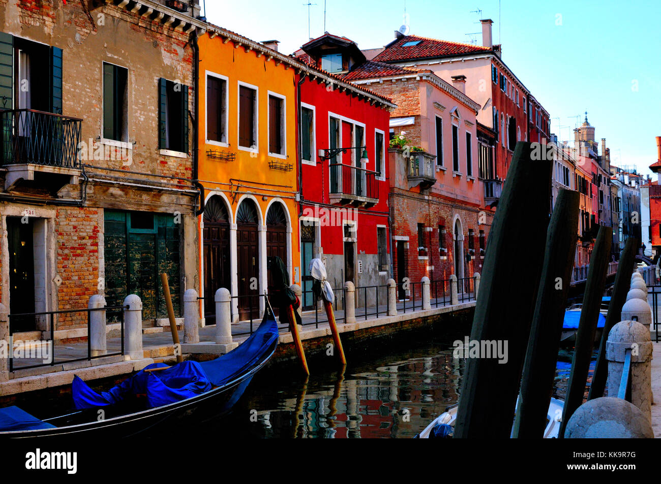 Canal with colourful houses in Venice Stock Photo - Alamy