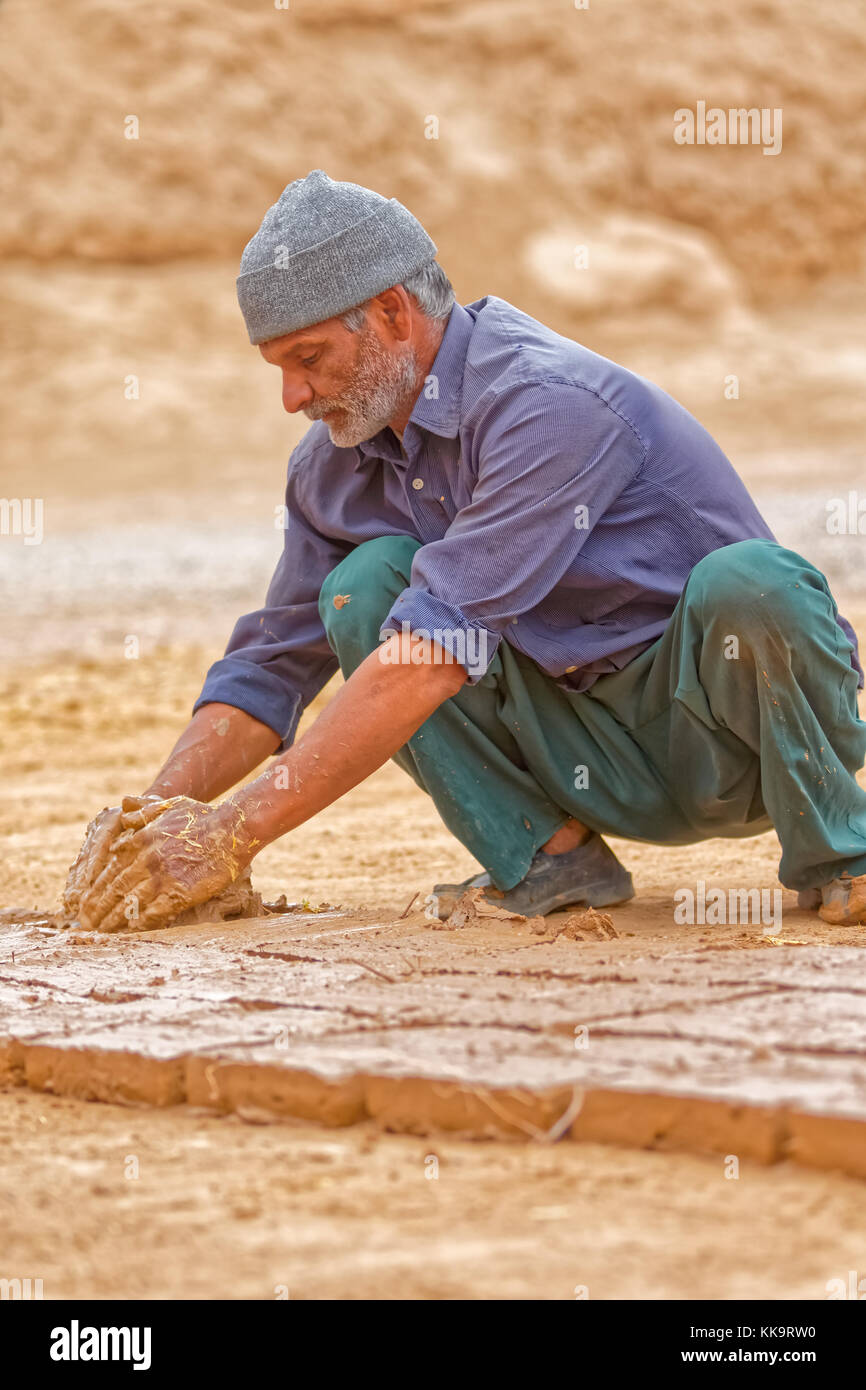 Man making mud bricks hi-res stock photography and images - Alamy