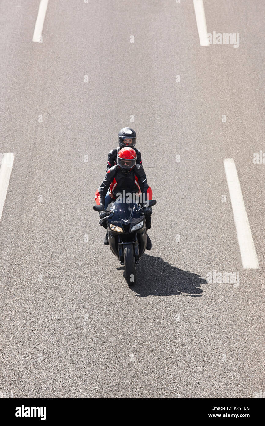 Motorcycle riders on the road. Travel and recreational background ...