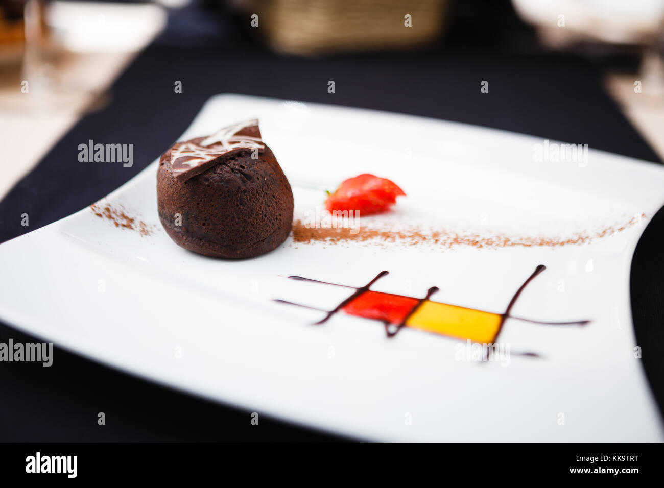 Chocolate fondant with vanilla ice cream and raspberry sauce Stock ...