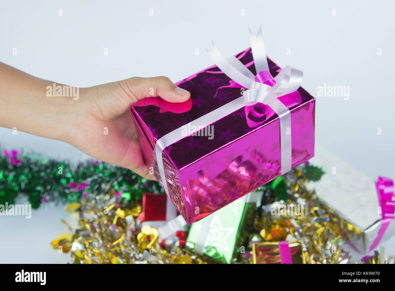 Children girl hand holding Christmas gift box,gift box in the girl's ...