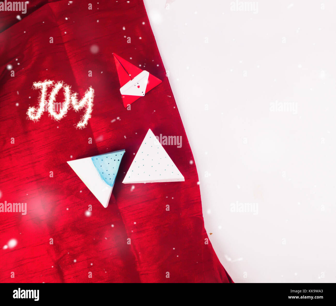 Christmas Decoration with mini triangle gift boxes and red scarves ...