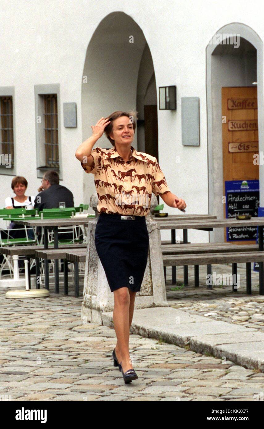 Princess Gloria von Thurn und Taxis walks across the abbey church ...