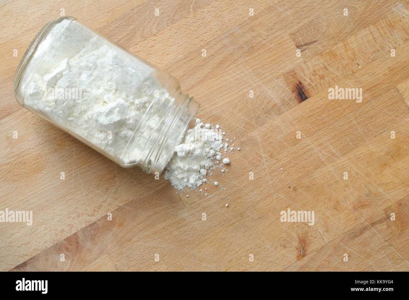 spilled flour from a glass jar, from above, large copy space Stock ...