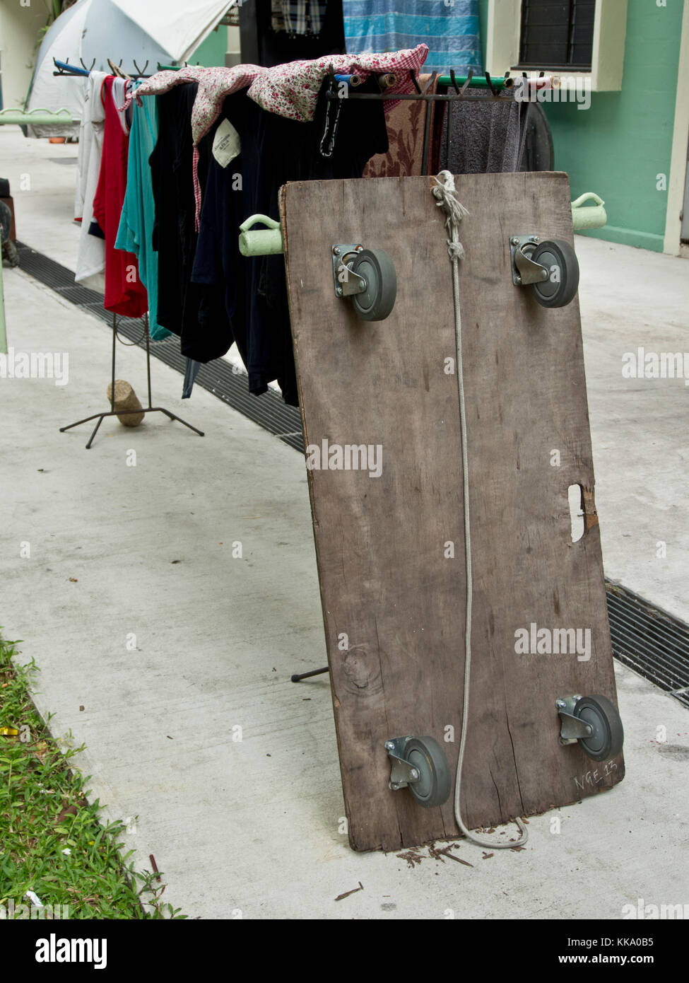 Crowded outdoors in low income housing in Singapore Stock Photo - Alamy