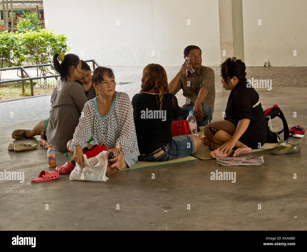 People in crowded outdoors in low income housing in Singapore Stock ...