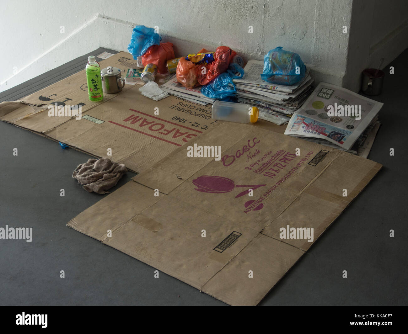 Low income people space to sleep outdoor in Singapore Stock Photo - Alamy