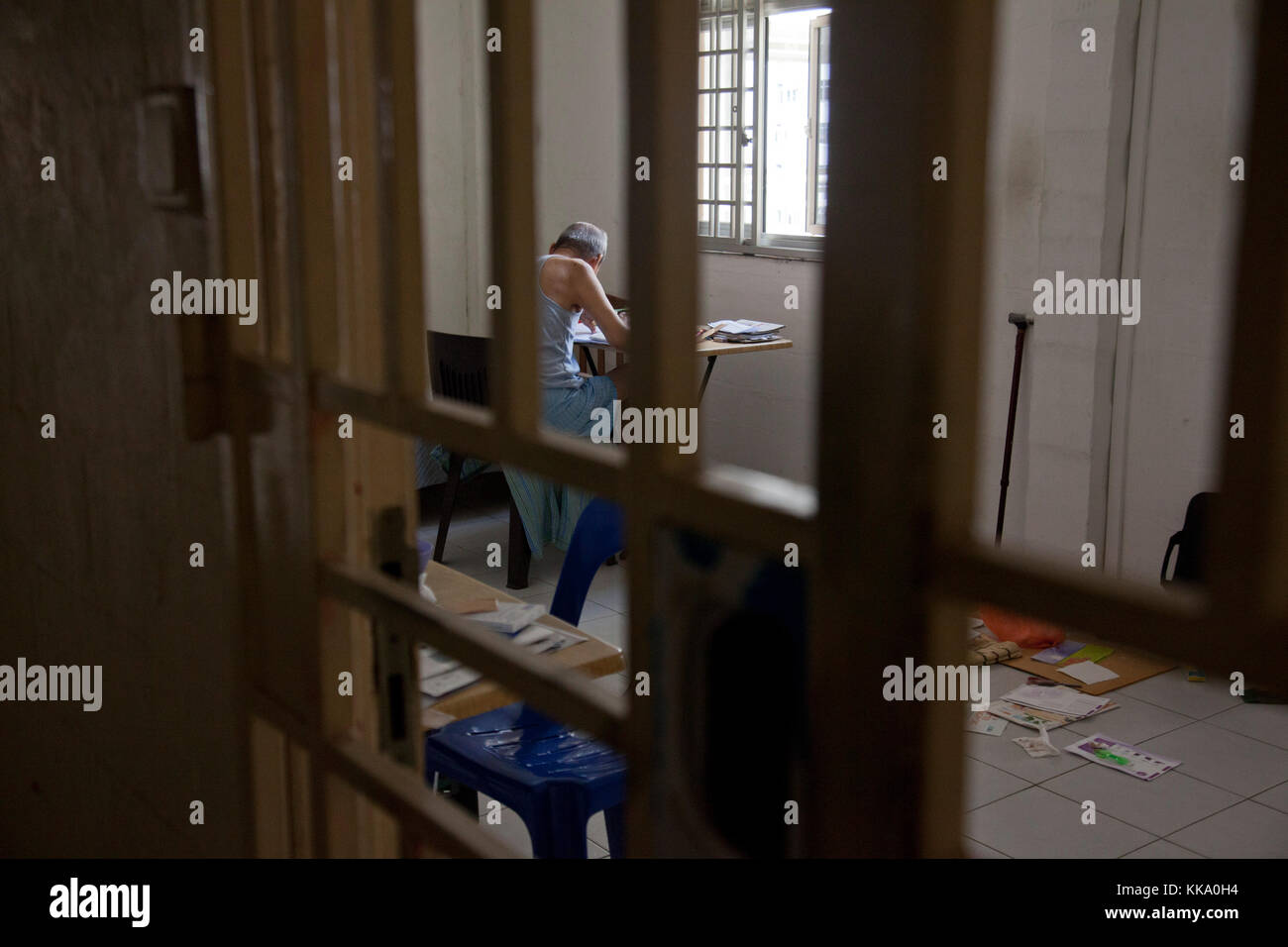 Senior citizen in low income HDB housing in Singapore Stock Photo - Alamy