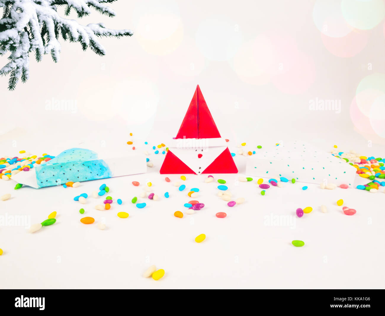 Christmas decoration triangle git boxes with colorful candy as confetti ...