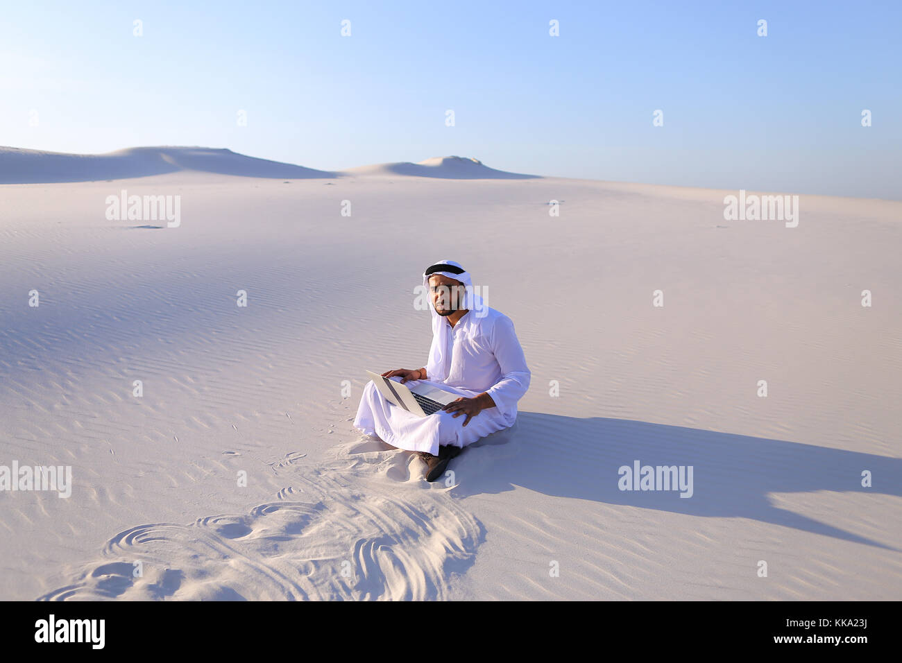 Emirati guy professional designer with computer projects project Stock ...