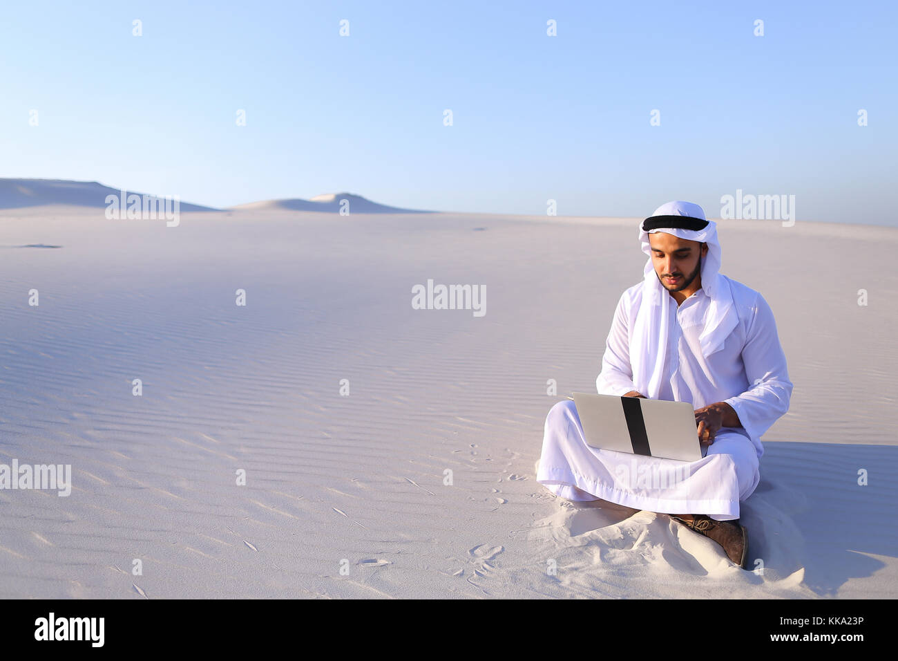 Emirati guy professional designer with computer projects project Stock ...
