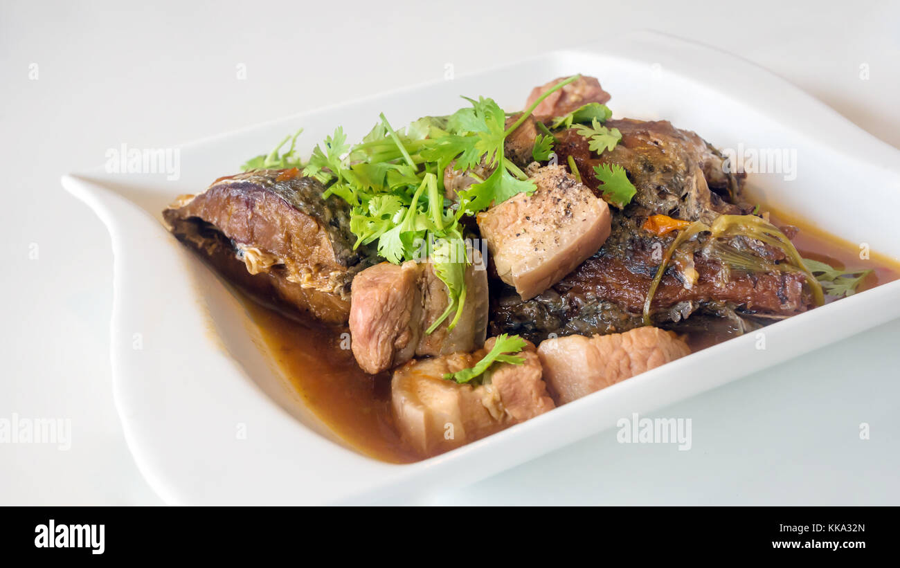 stewed pork and fish with herb , vietnamese style food Stock Photo - Alamy