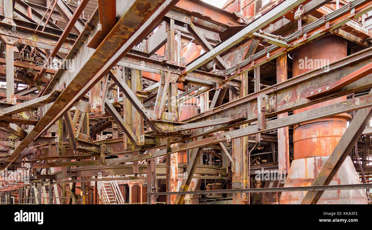 weathered rusty industrial scenery with old corroded steel girders and ...