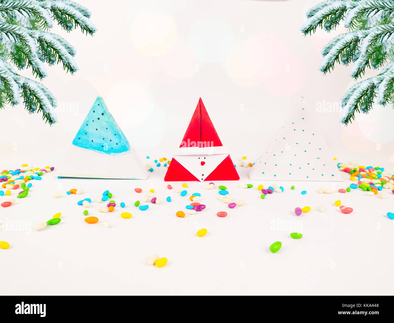 Christmas decoration triangle gift boxes with colorful candies from the ...