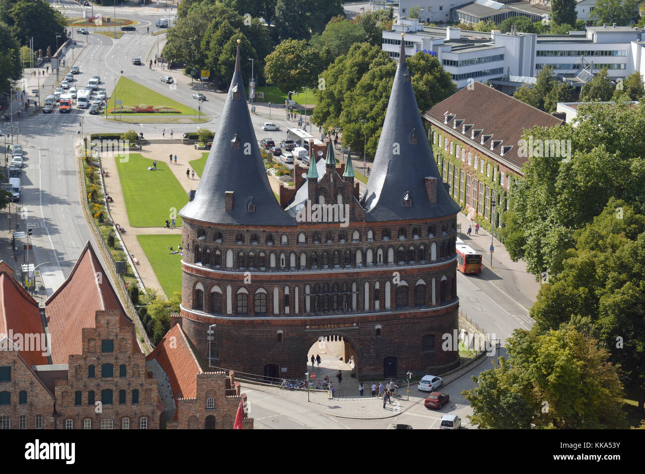 Aerial view on the Holsten Gate, a city gate, and old warehouses in ...