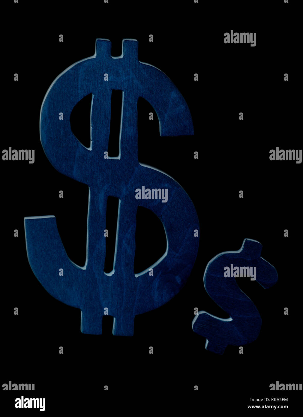 Big end small dollar sign on black Stock Photo - Alamy