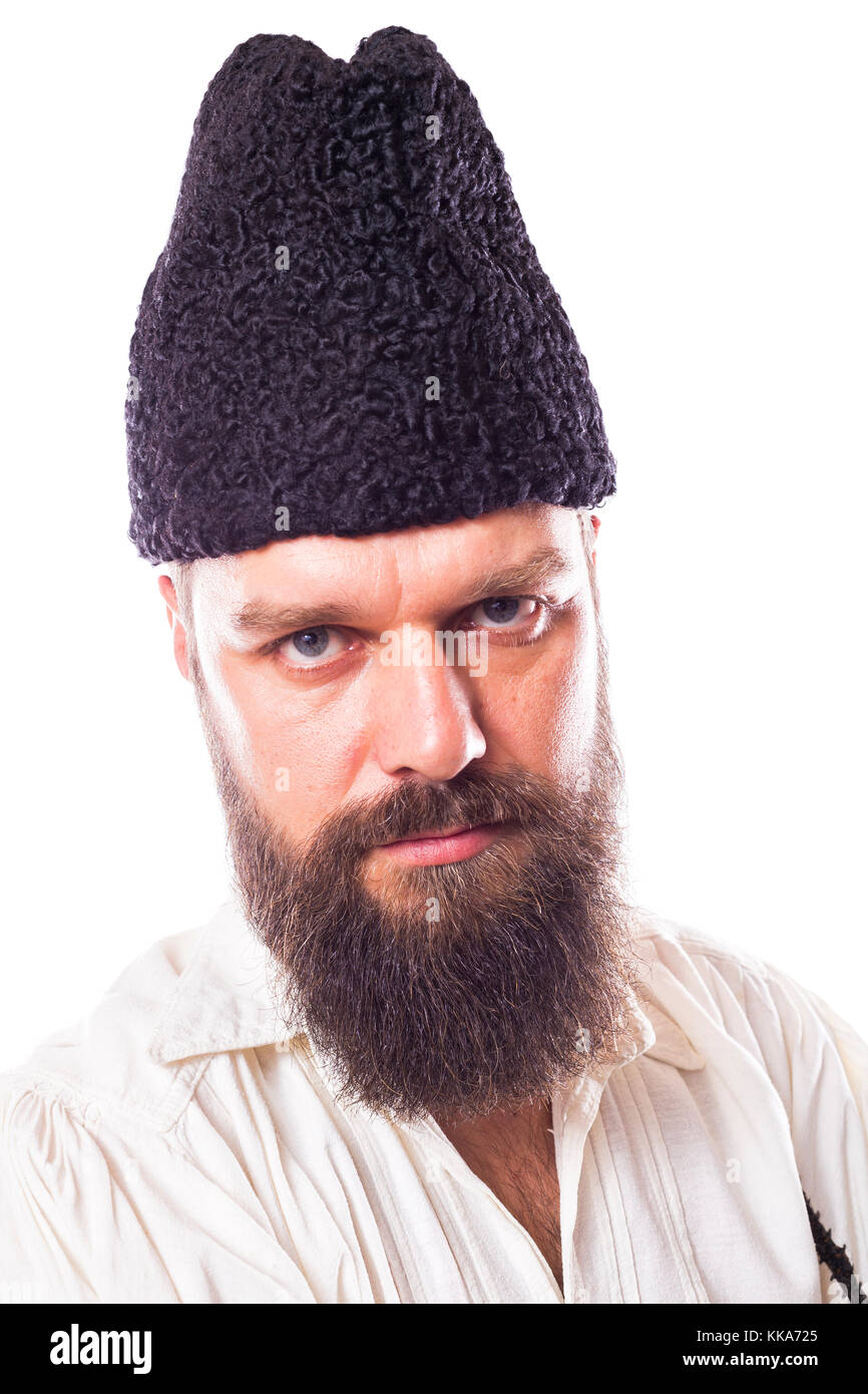 young man wearing traditional romanian costume on white background ...