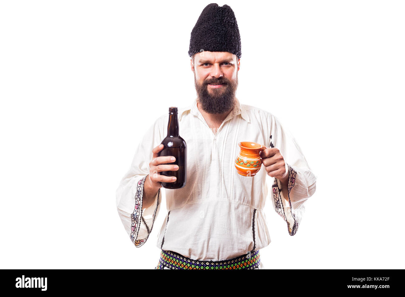 young man wearing traditional romanian costume on white background ...