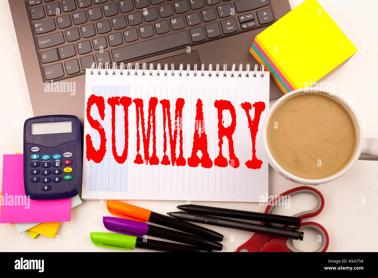 Word writing Summary in the office with laptop, marker, pen, stationery ...