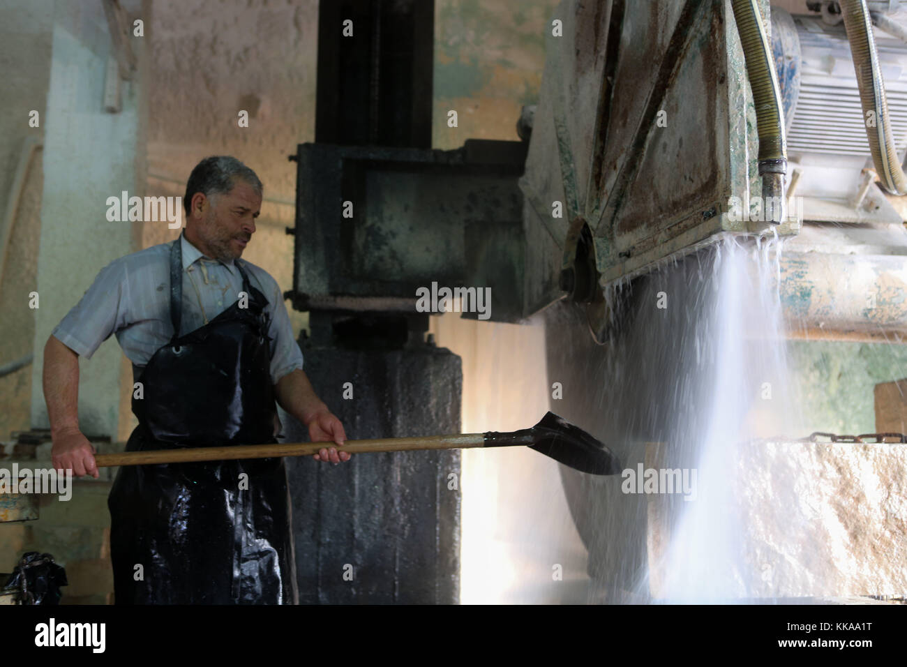 A stone workshop in Syria where local sawyers and banker masons cut the ...