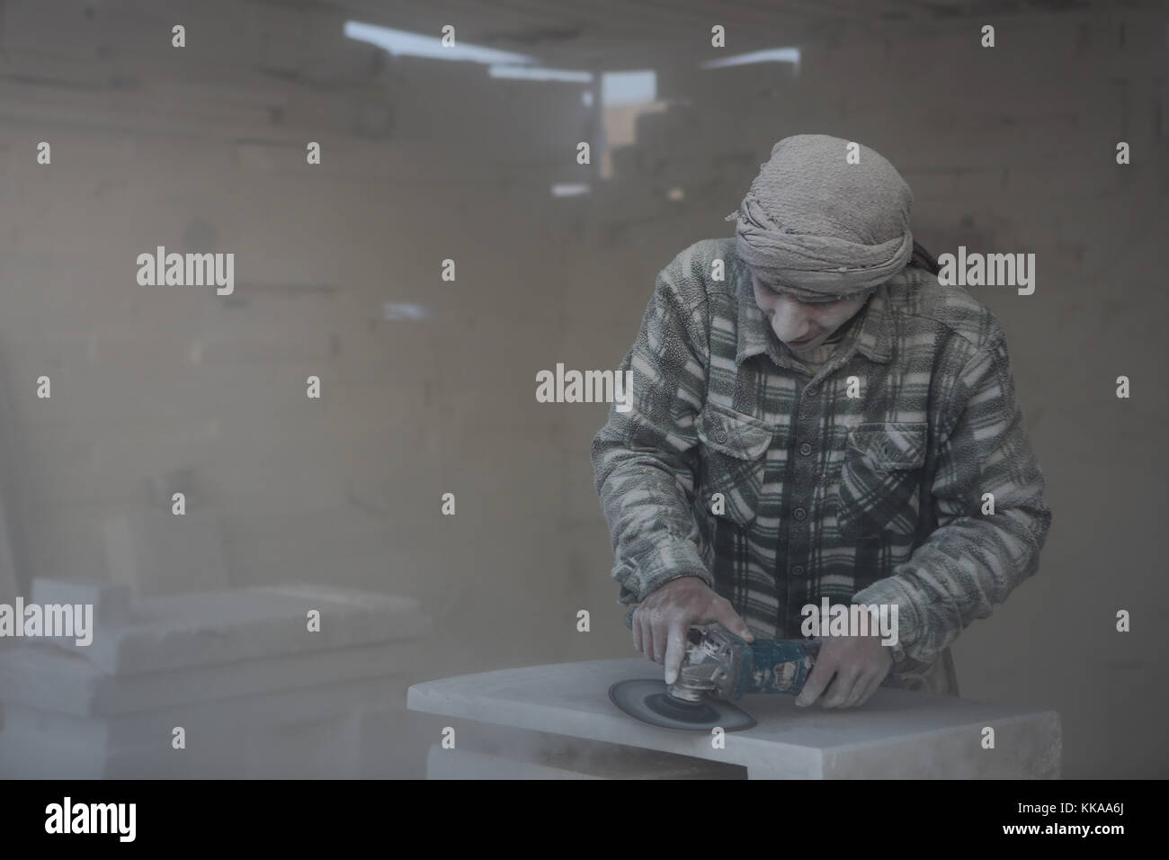 A stone workshop in Syria where local sawyers and banker masons cut the ...