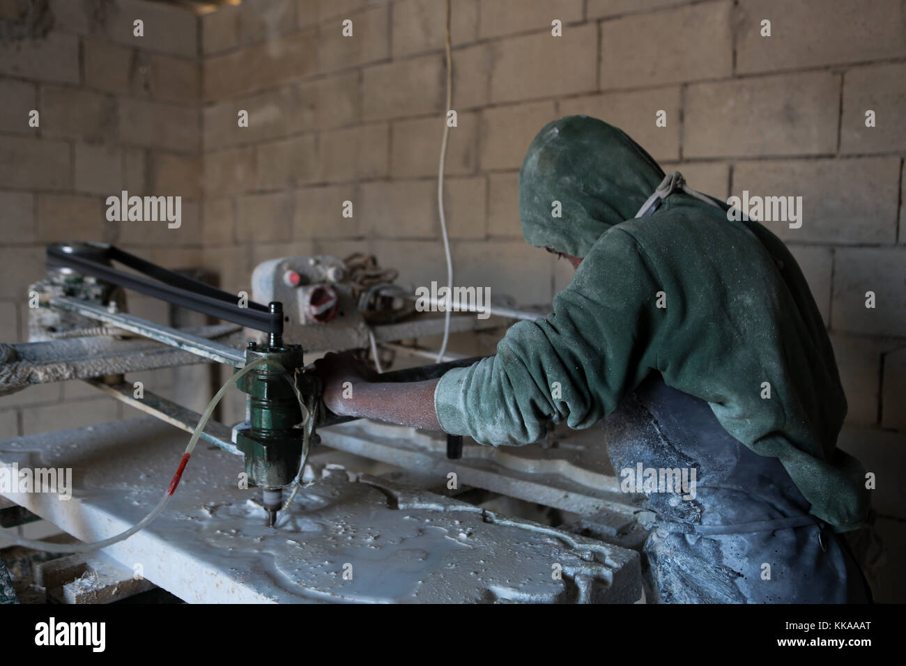 A stone workshop in Syria where local sawyers and banker masons cut the ...