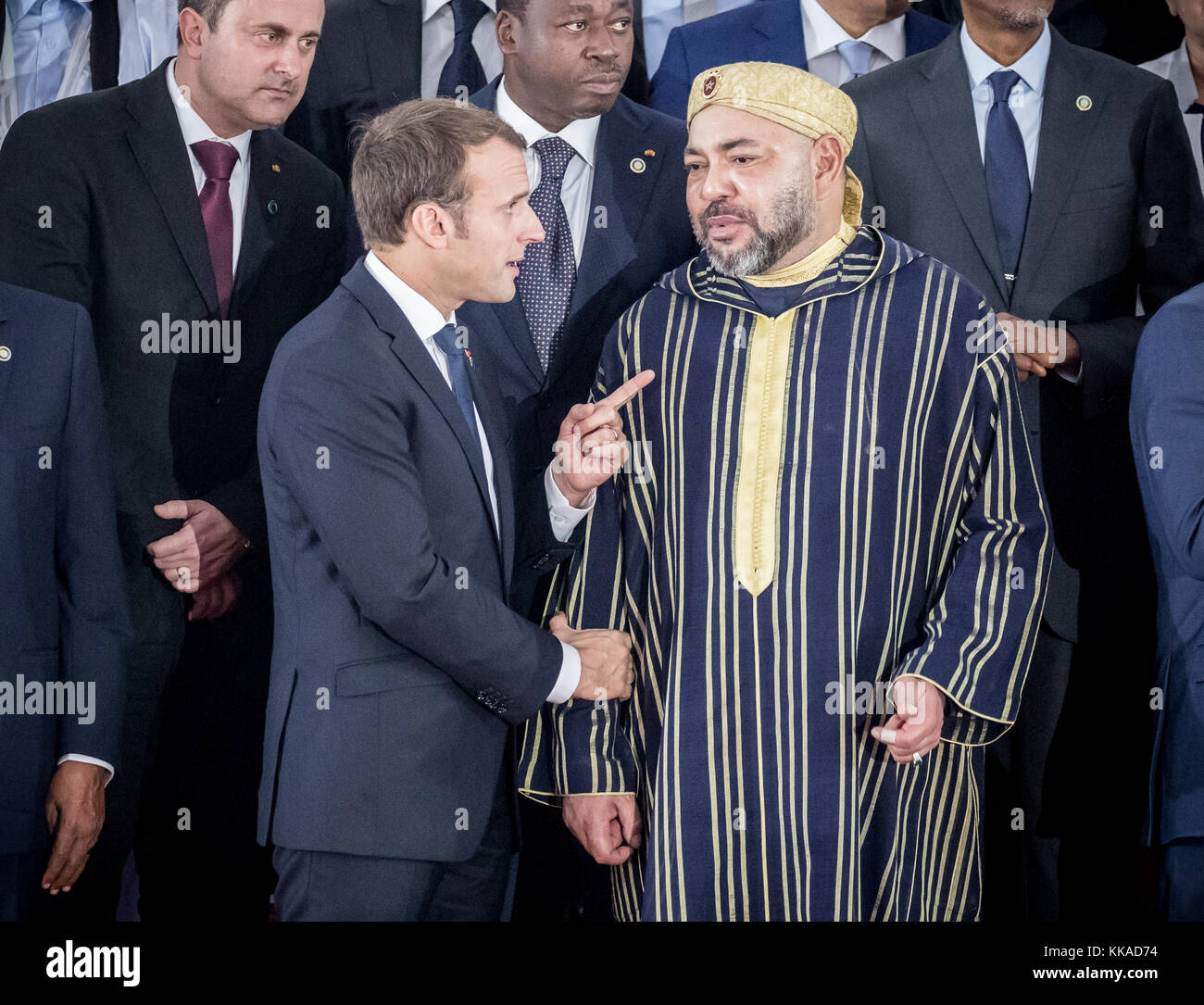 France's President Emmanuel Macron talks to the King of Morocco ...