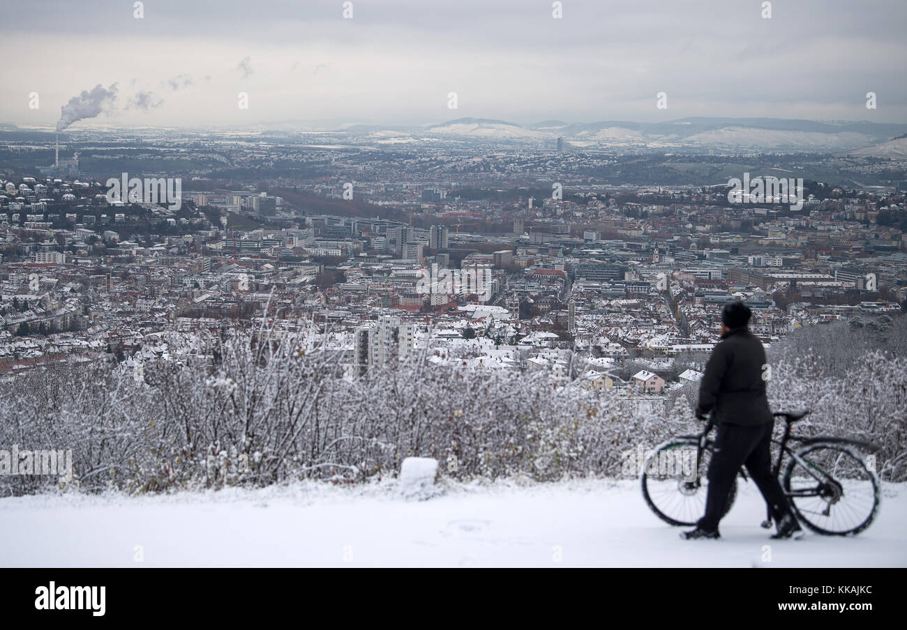 Stuttgart, Germany. 30th Nov, 2017. A man looking over the snow-covered ...