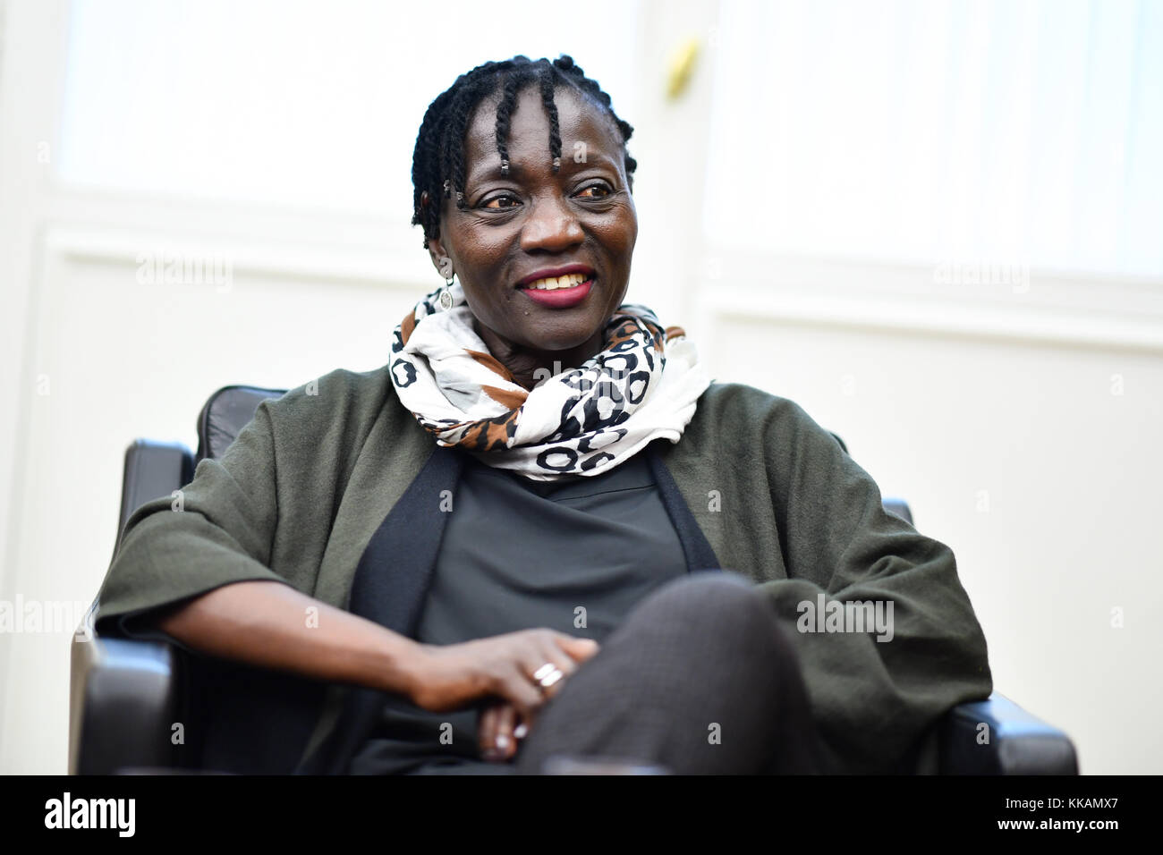 Heidelberg, Germany. 30th Nov, 2017. Kenian author Auma Obama sits in ...