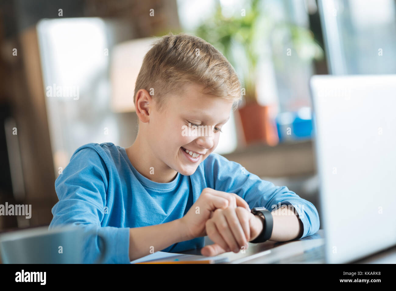 Checking time boy hi-res stock photography and images - Alamy
