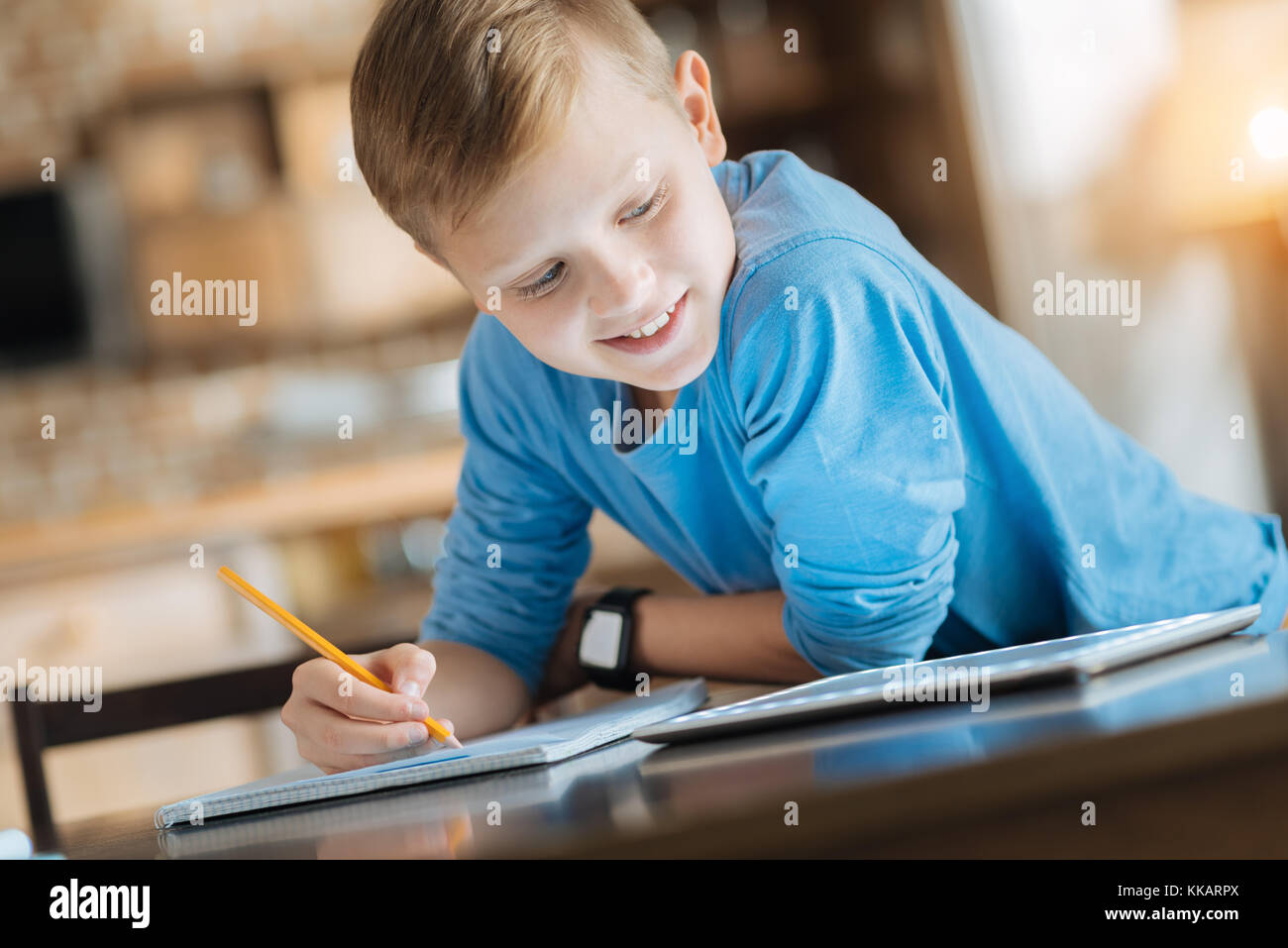 Inside indoors leaning forward hi-res stock photography and images - Alamy