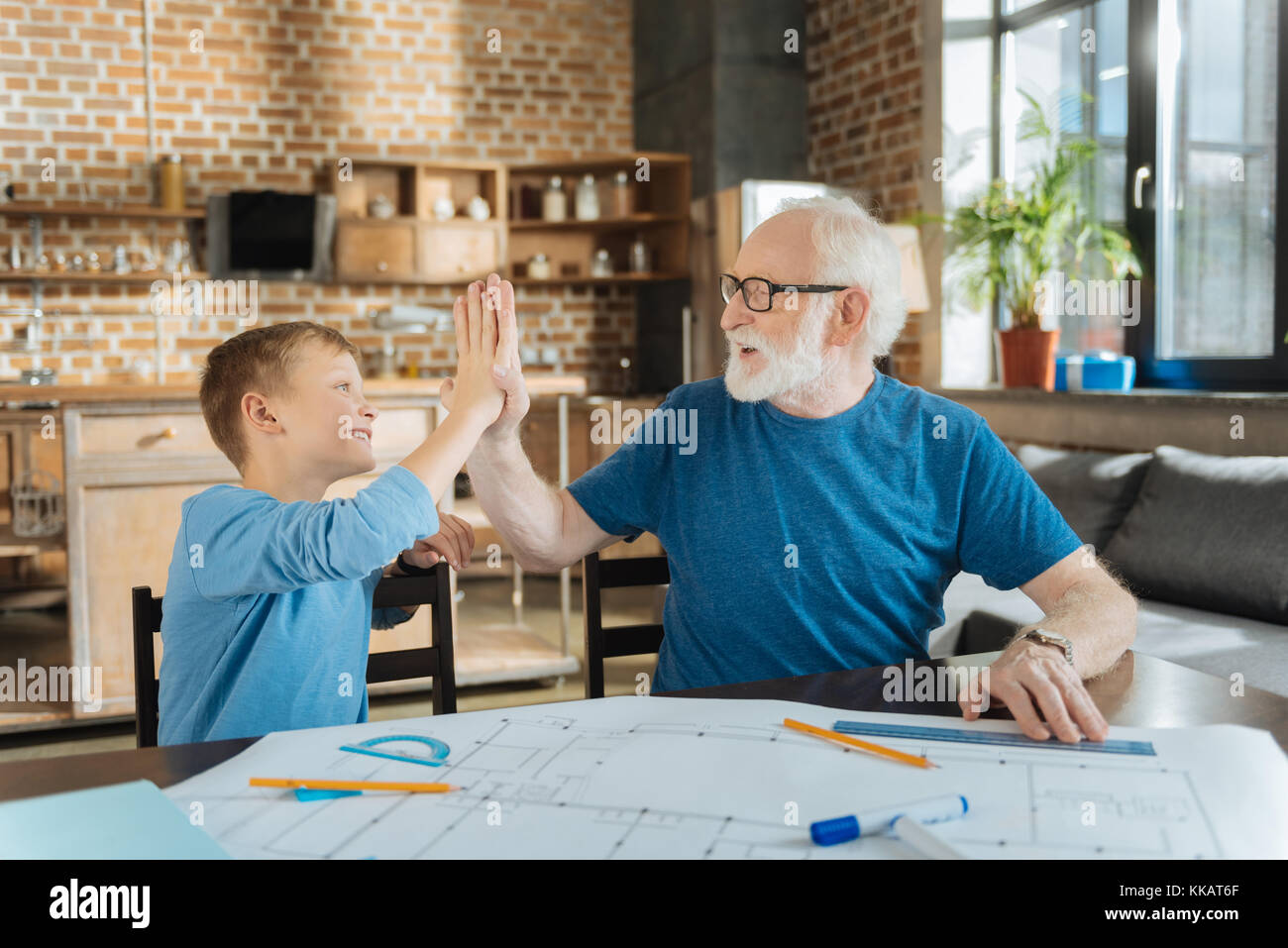 Happy high five mature hi-res stock photography and images - Alamy